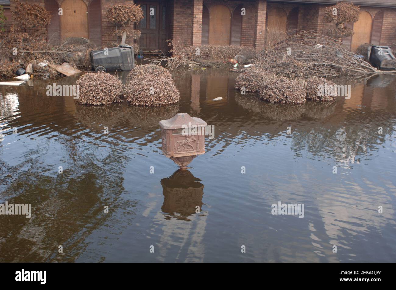 Aircrafts - Sand Baggers - 26-HK-57-30. Flooding and debris in front ...