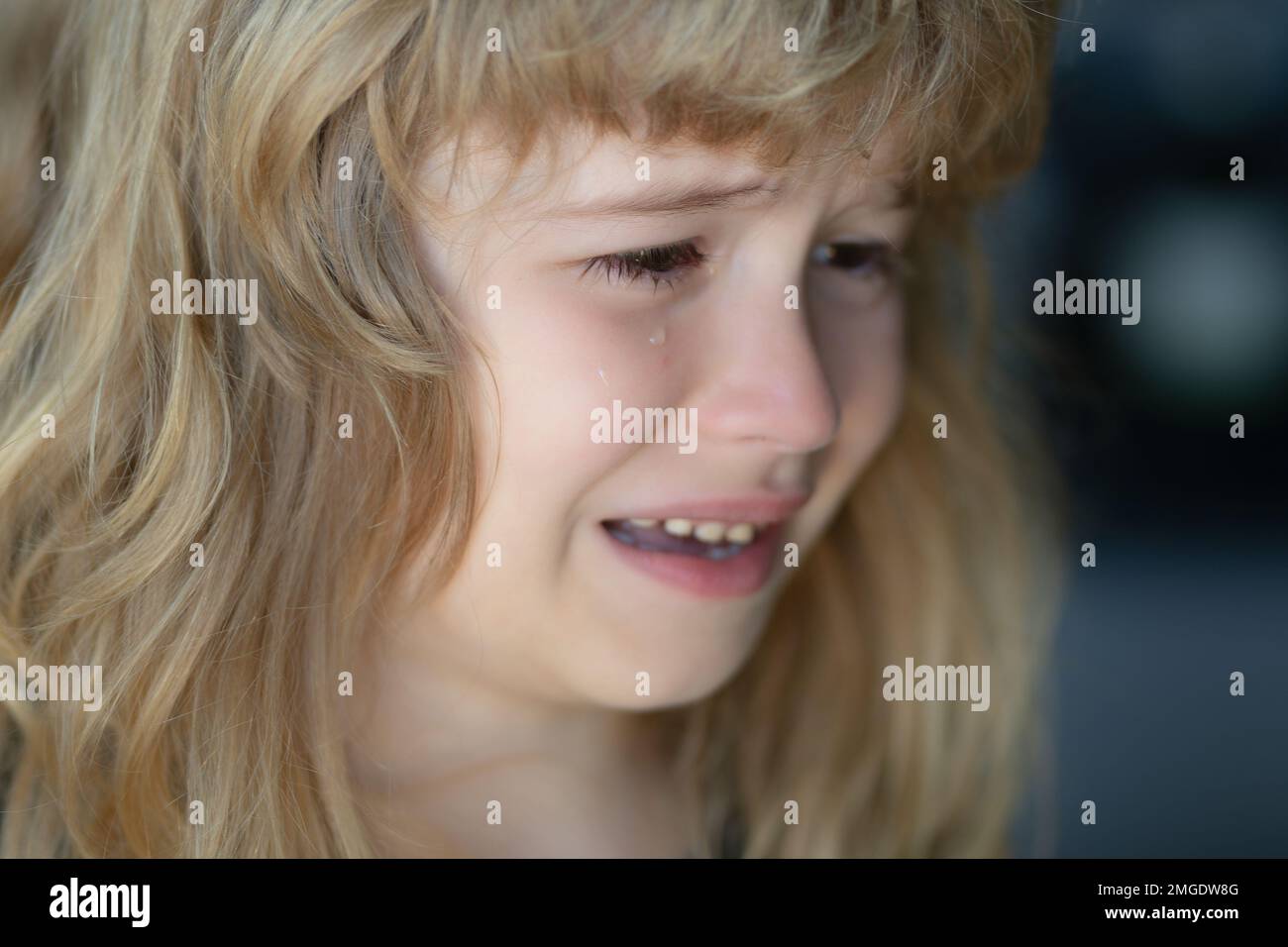Kid crying with a tear on cheek. Child with sad expressions, crying ...