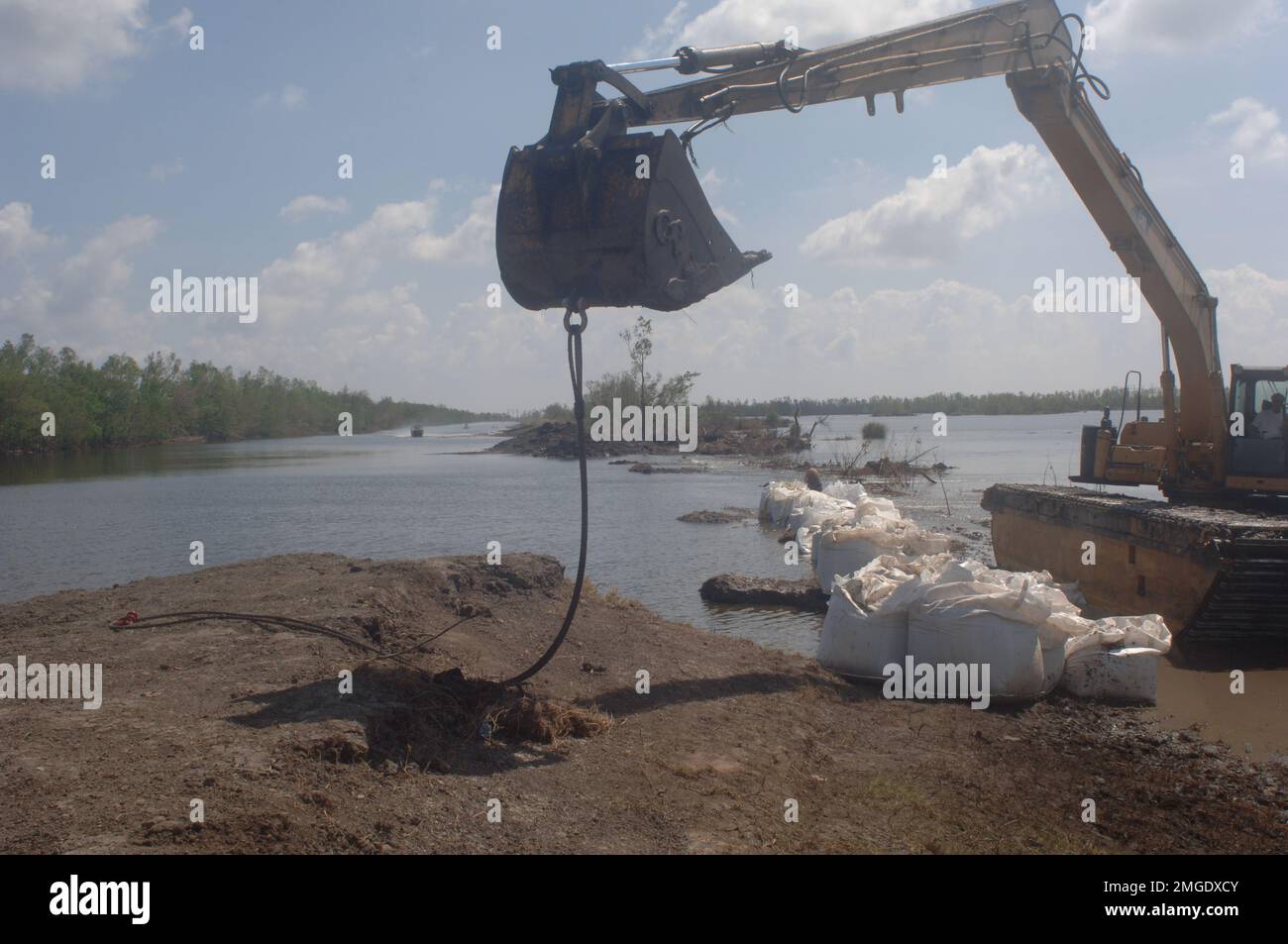 Aircrafts - Sand Baggers - 26-HK-57-125. Row of sand bags and digger ...