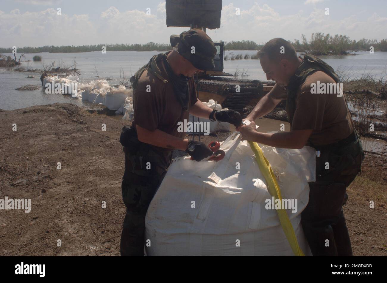 Aircrafts - Sand Baggers - 26-HK-57-104. Military personnel preparing ...