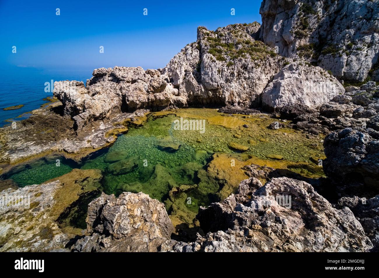 Pool of Venus, Piscina di Venere, a beautiful pool surrounded by rocks ...