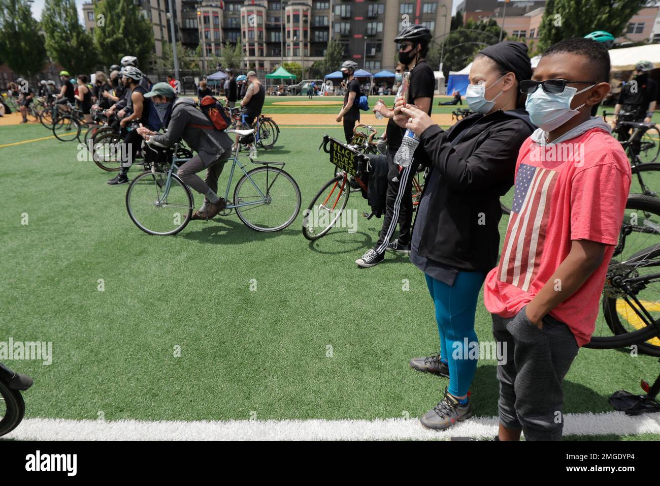 Xavier Smalls, 15, right, stands with his mother, Ana Smalls, after ...