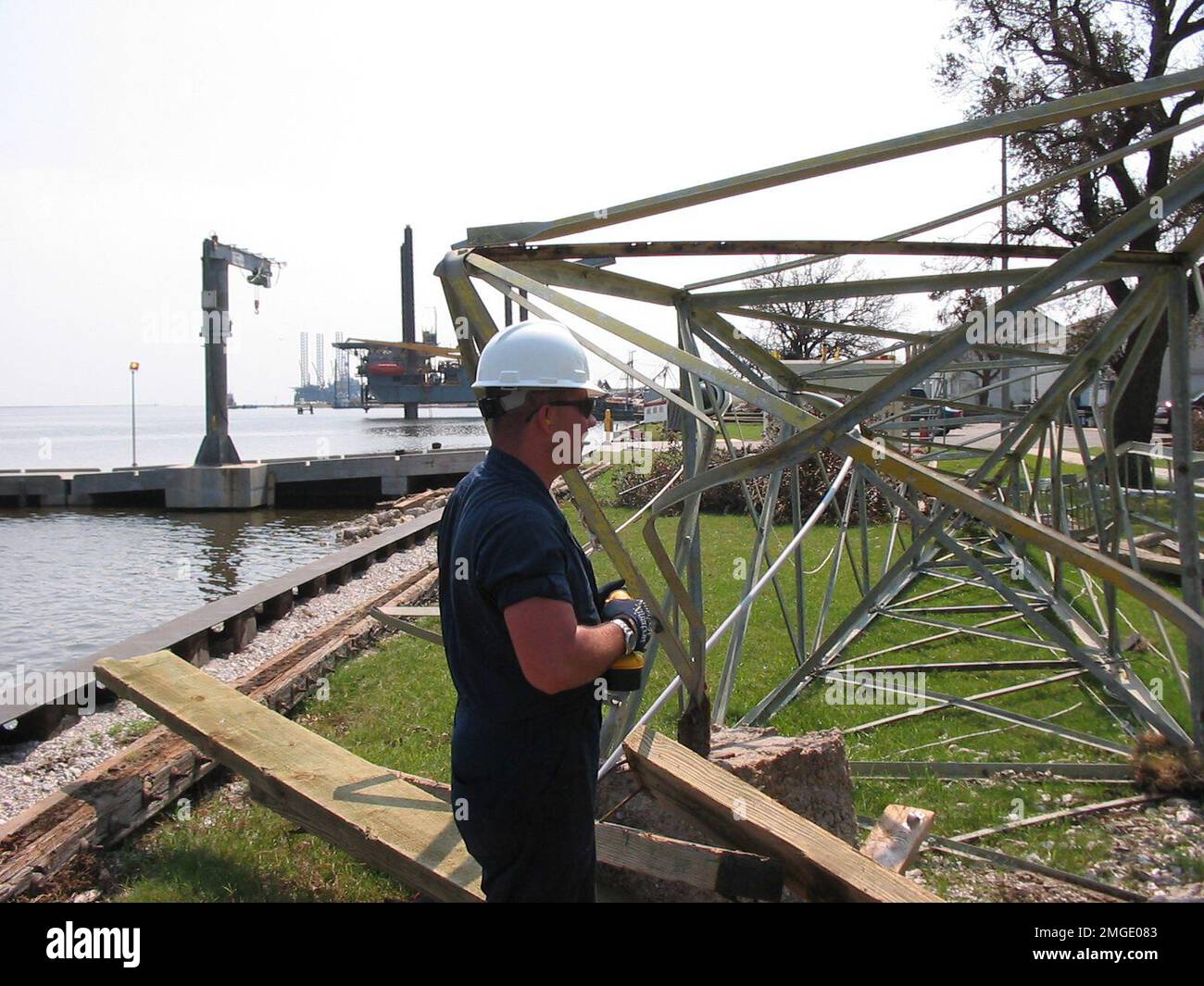 Station Sabine, Texas - 26-HK-2-7. Coastie viewing knocked over tower ...