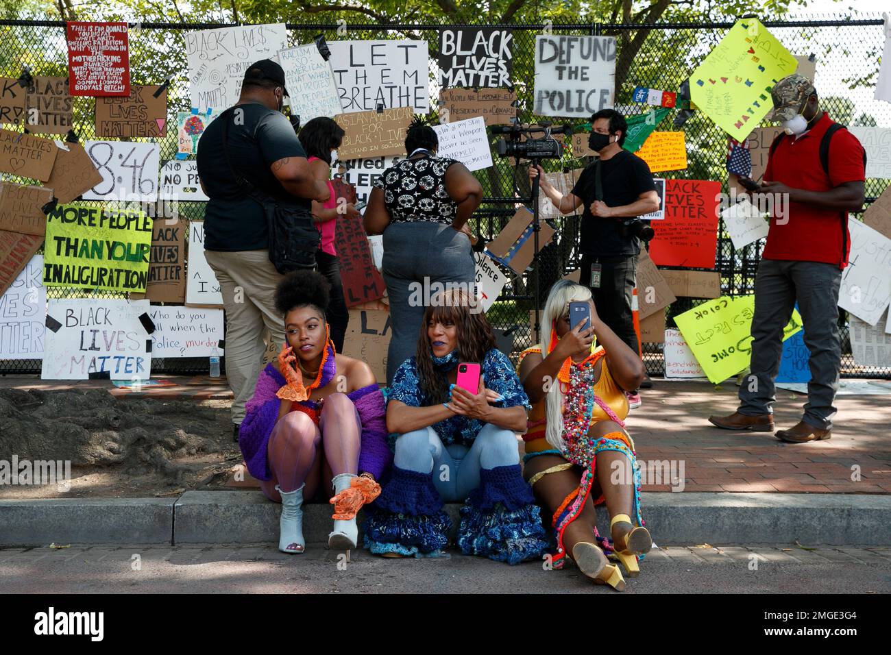 Tia Farrell, left, Tangee Massey, and Shalonda Harris, all of Richmond ...