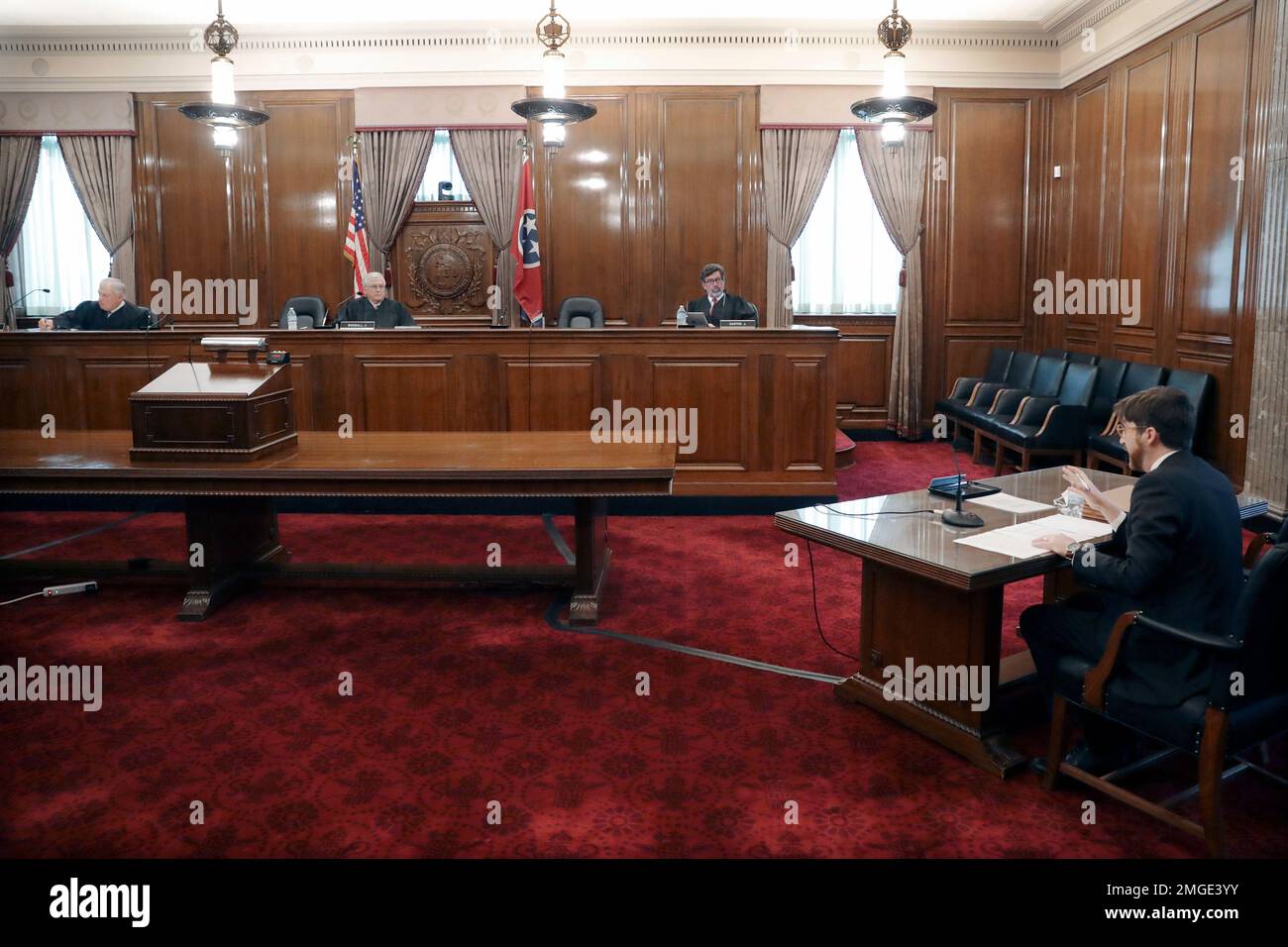 Deputy Attorney General Zachary Hinkle, far right, speaks to judges ...