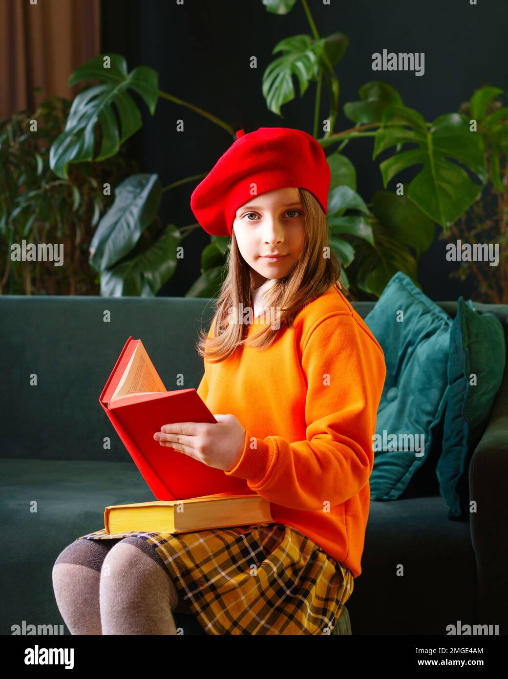 Young girl is reading book. Concept of book lover. Retro vibe. Child ...
