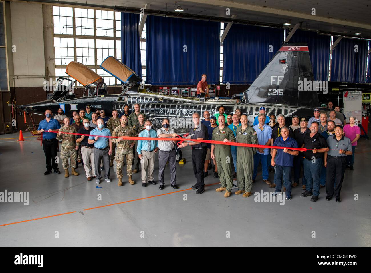 Civilians and military members part of the Talon Repair Inspections and ...