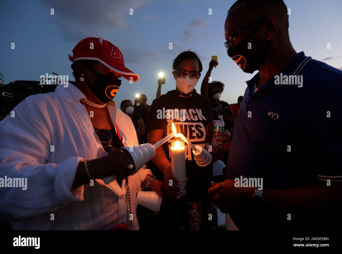 Local residents and Alumni of Jack Yates High School take part in a ...