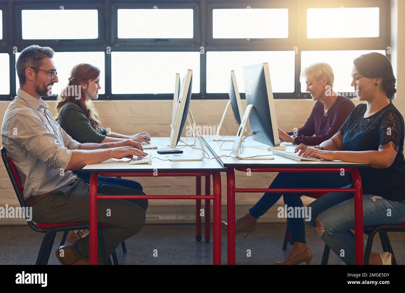 Office staff work on computers hi-res stock photography and images - Alamy