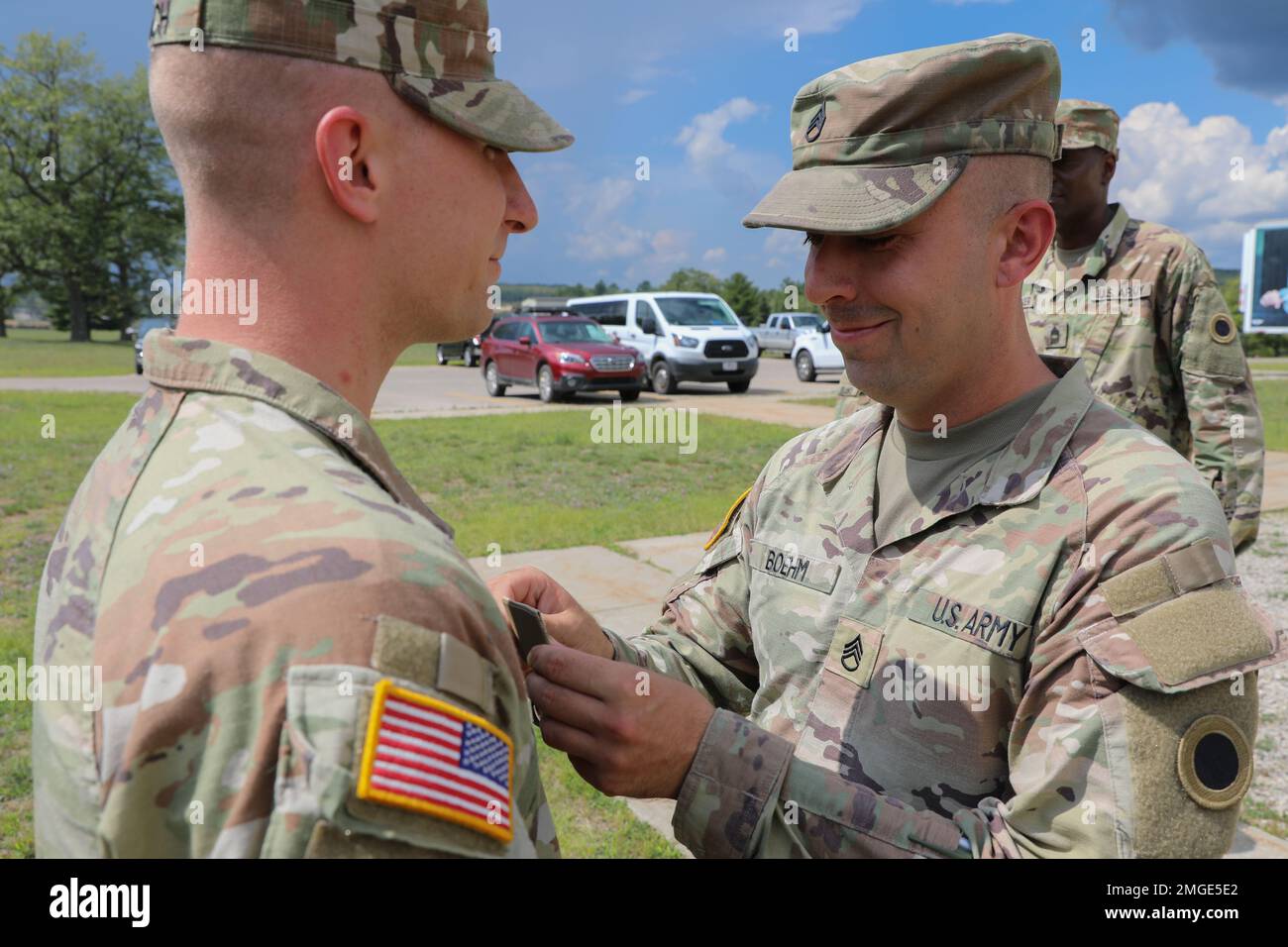 U.S. Army Staff Sgt. Nikolaus B. Boehm, right, assistant operations non ...