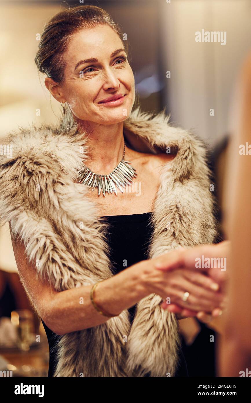 Success, handshake or woman in a party shaking hands for partnership ...