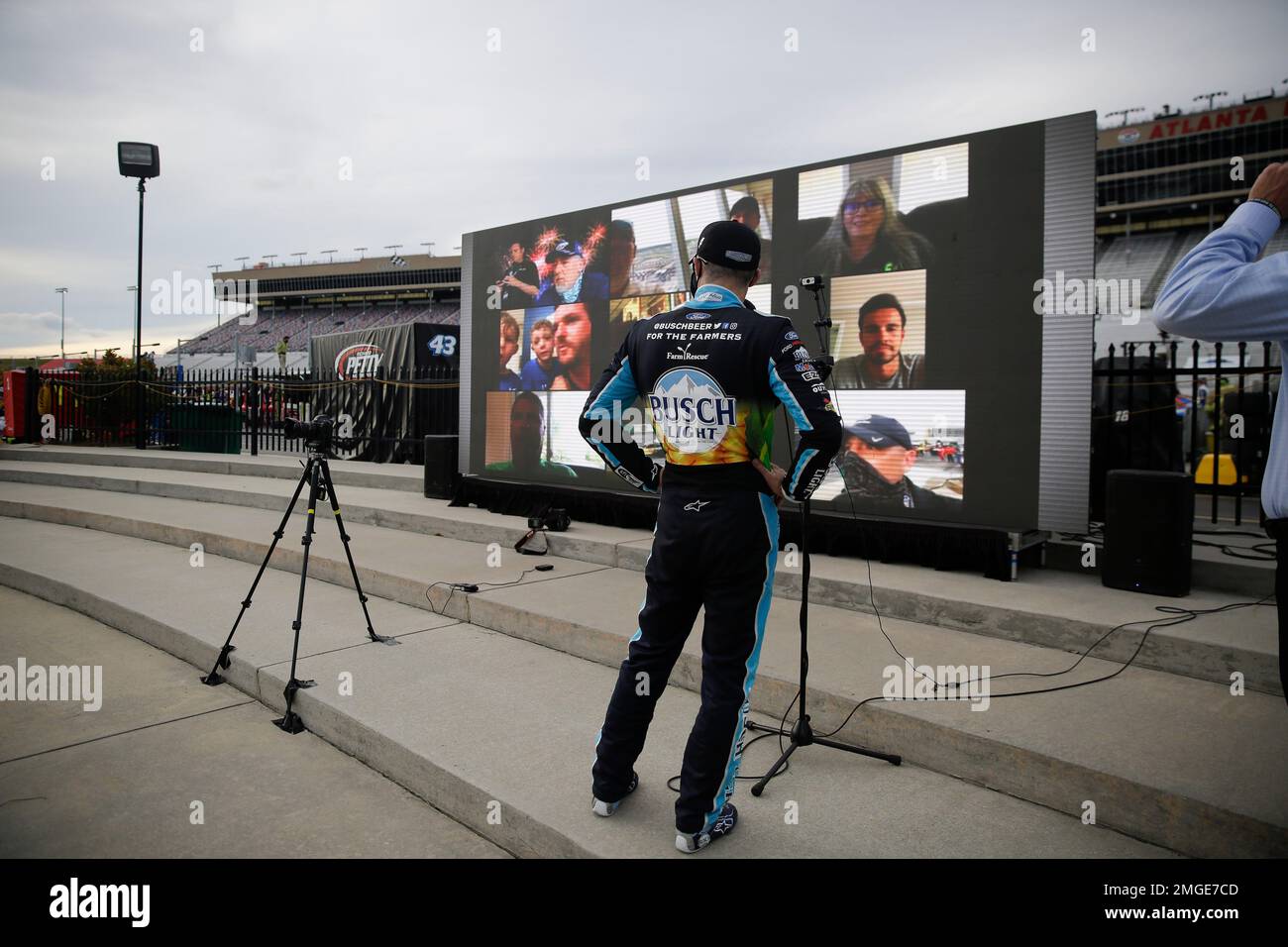 Kevin Harvick (4) celebrates with friends on a screen after winning the ...