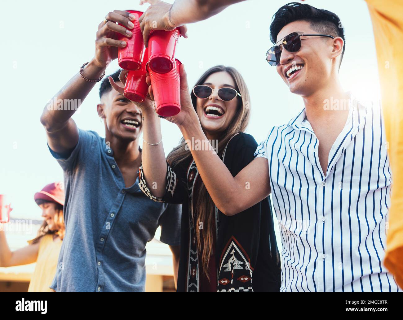 Party, drinks and cheers with friends outdoor to celebrate at festival ...