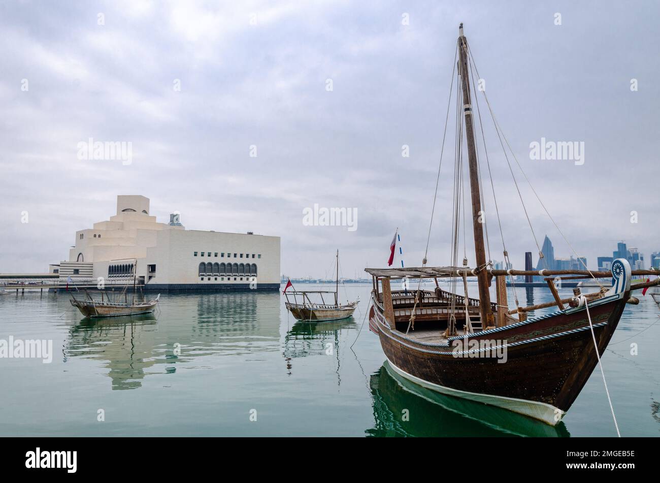 Traditional Dhow boats behind Museum of Islamic Art, Doha, Qatar Stock ...