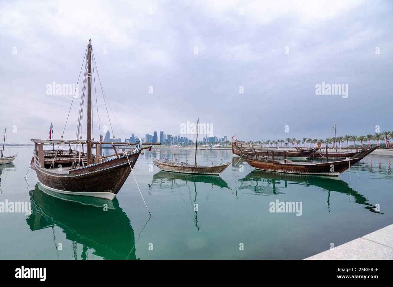 Traditional Dhow boats behind Museum of Islamic Art, Doha, Qatar Stock ...