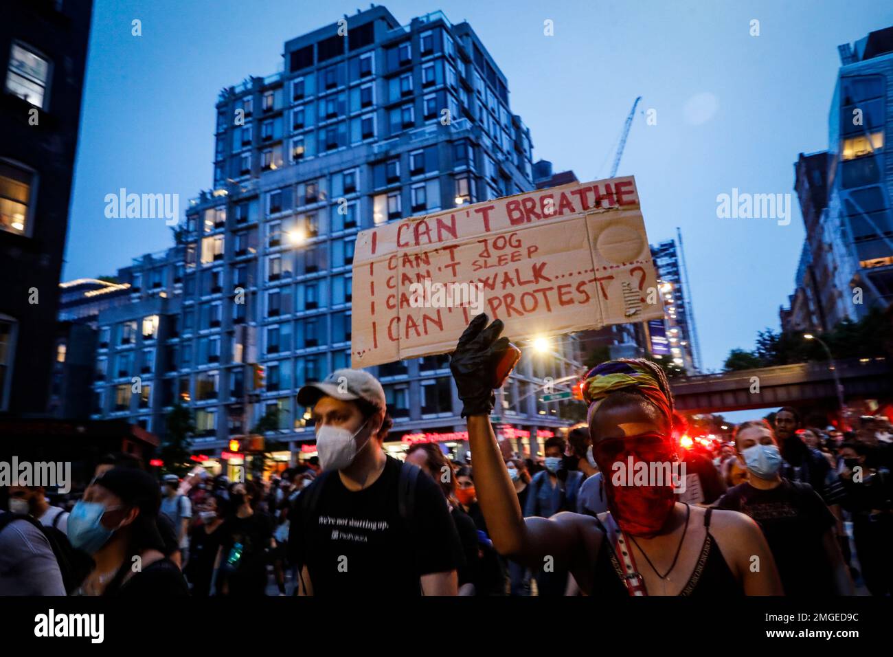 Protesters break curfew and march, Thursday, June 4, 2020, in the ...