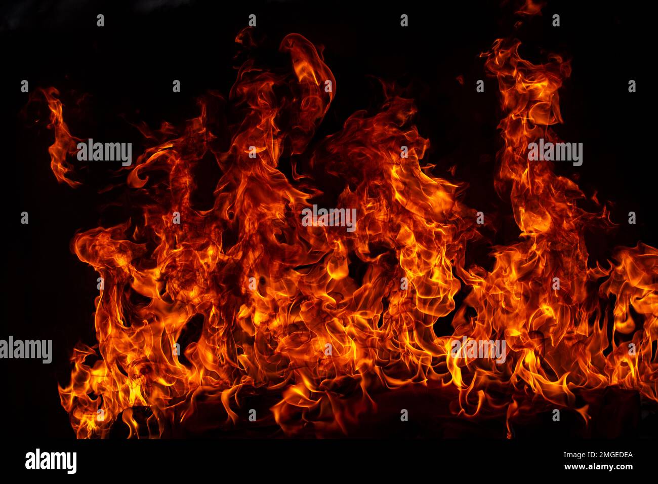 Blaze burning fire flame on art texture background Stock Photo - Alamy