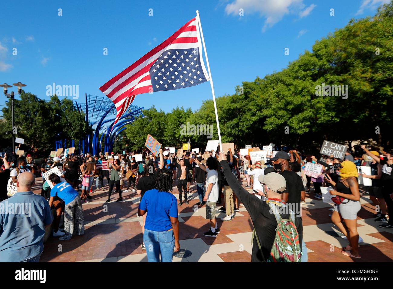 Demonstrators gather at Addison Circle Park to peacefully protest in ...