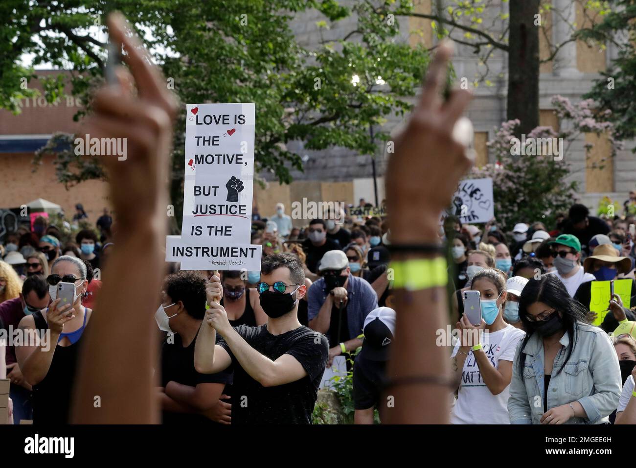 People attend a protest against police brutality, Thursday, June 4 ...