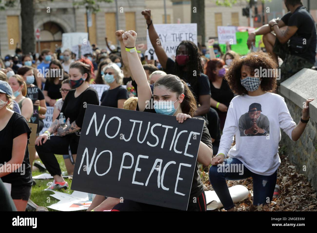 People attend a protest against police brutality, Thursday, June 4 ...