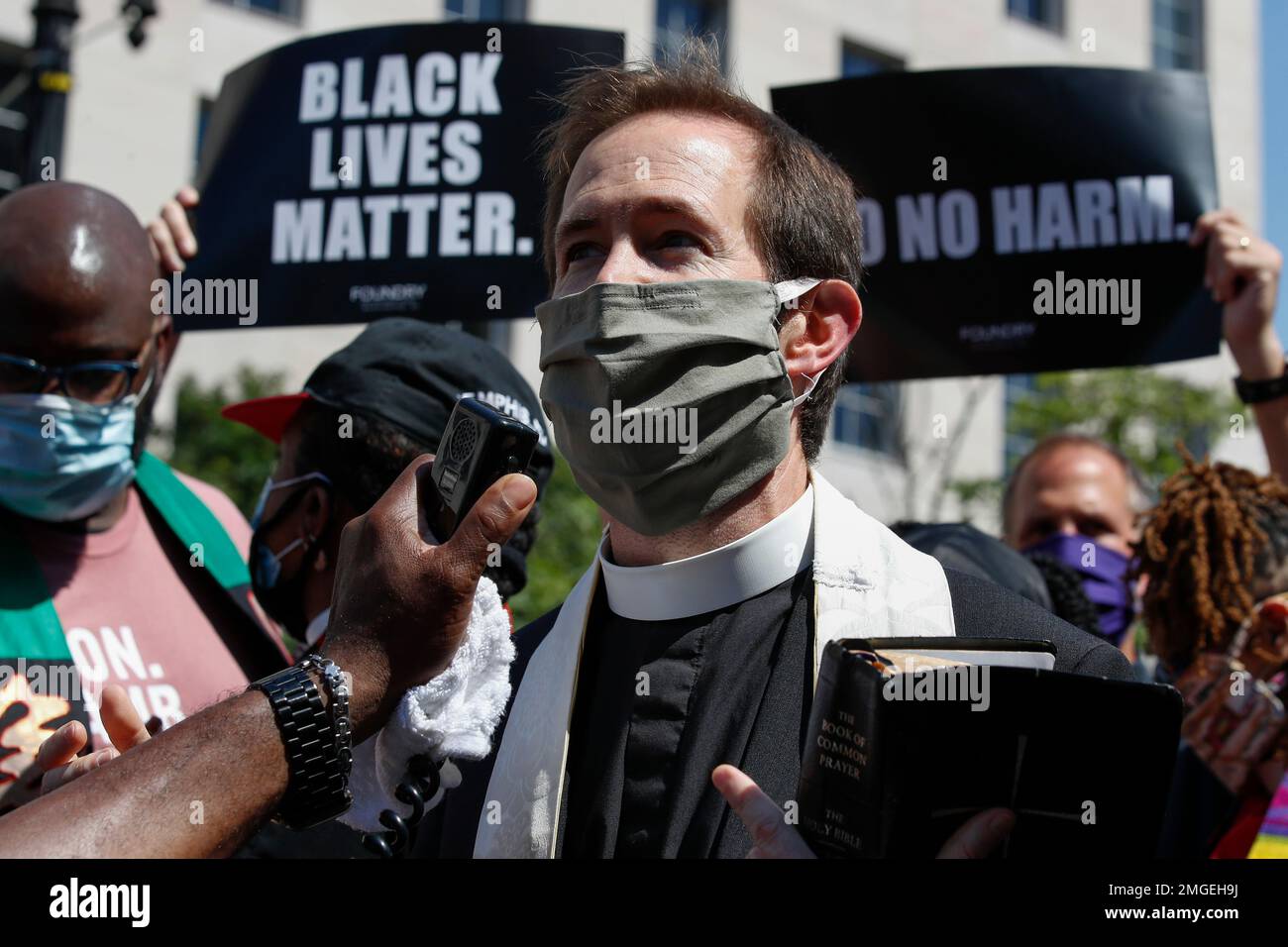 Rev. Robert Fisher, rector of St. John's Church, speaks, Wednesday ...