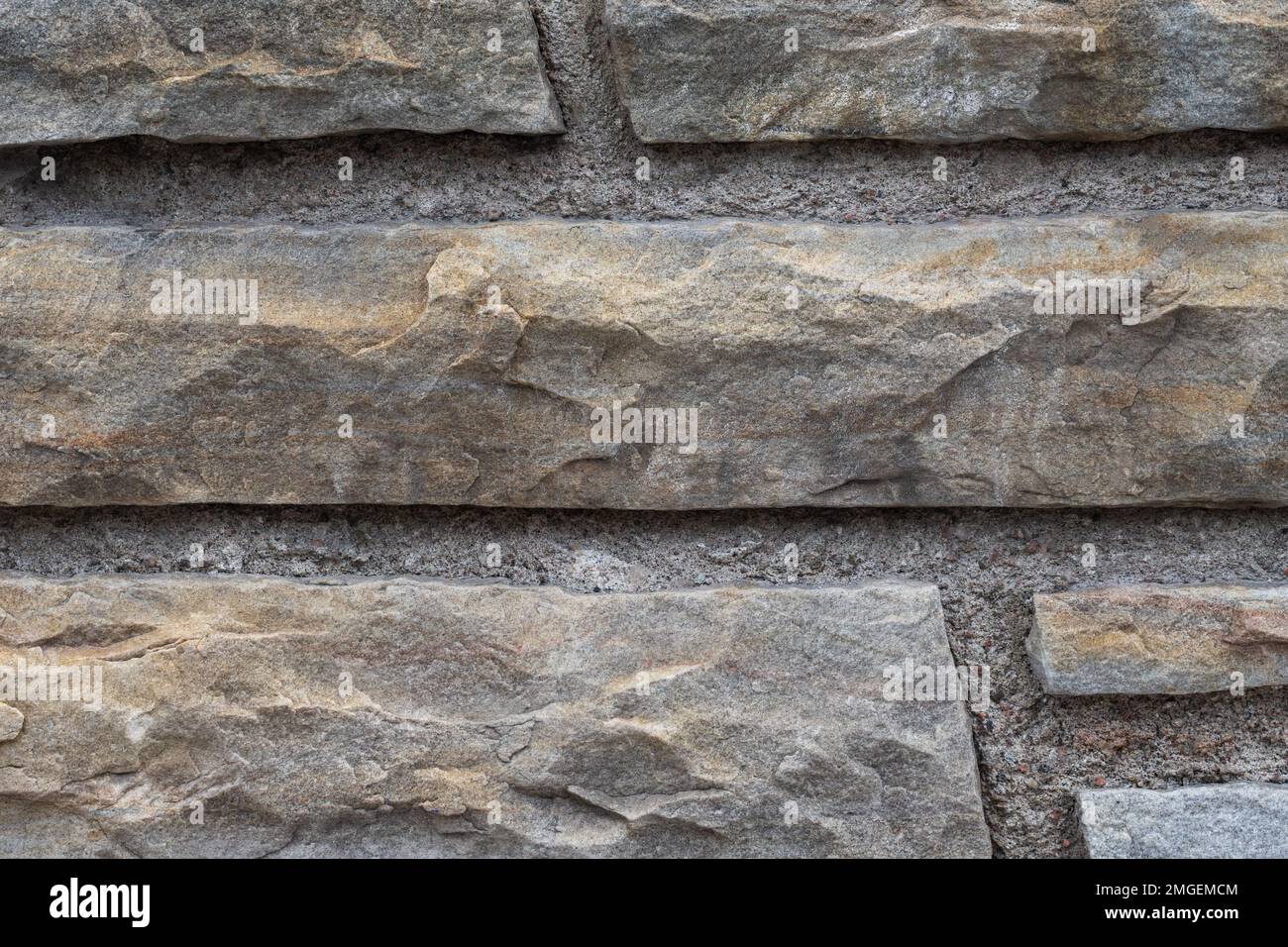 Large stone wall grey texture background, close up Stock Photo - Alamy