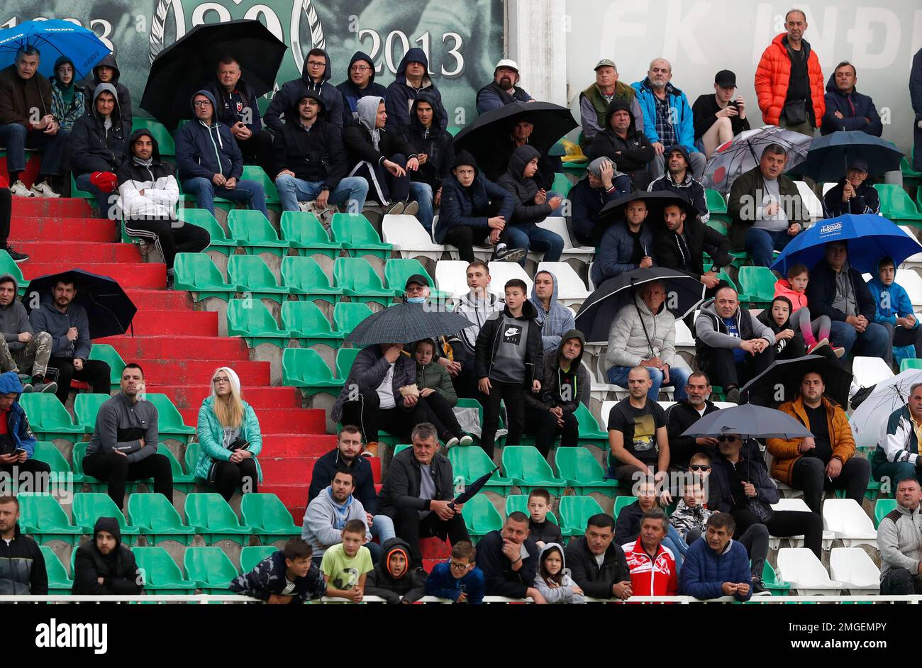 Soccer fans watch the Serbian Cup soccer match between FK Indjija and ...