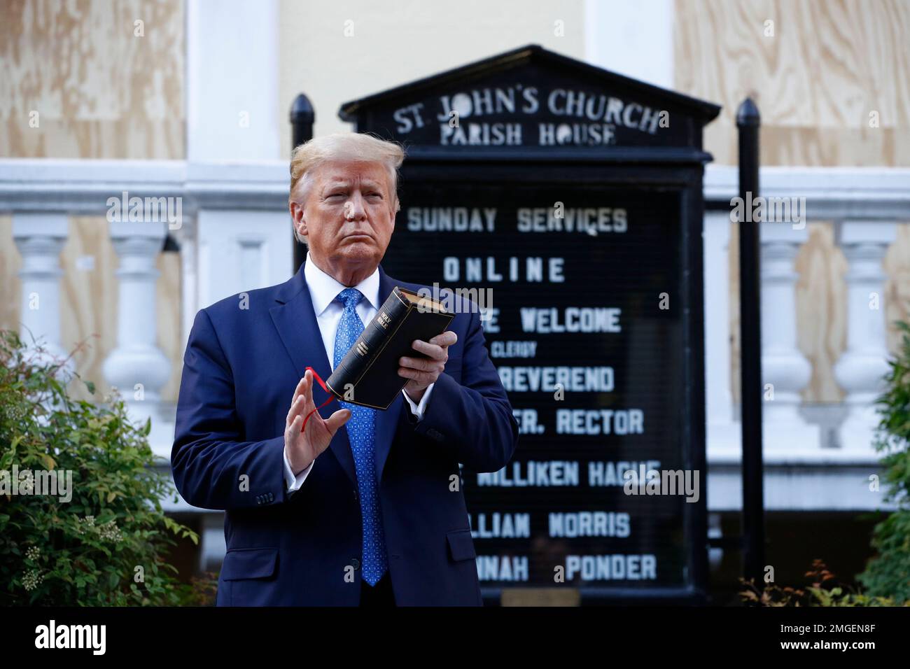 President Donald Trump holds a Bible as he visits outside St. John's ...