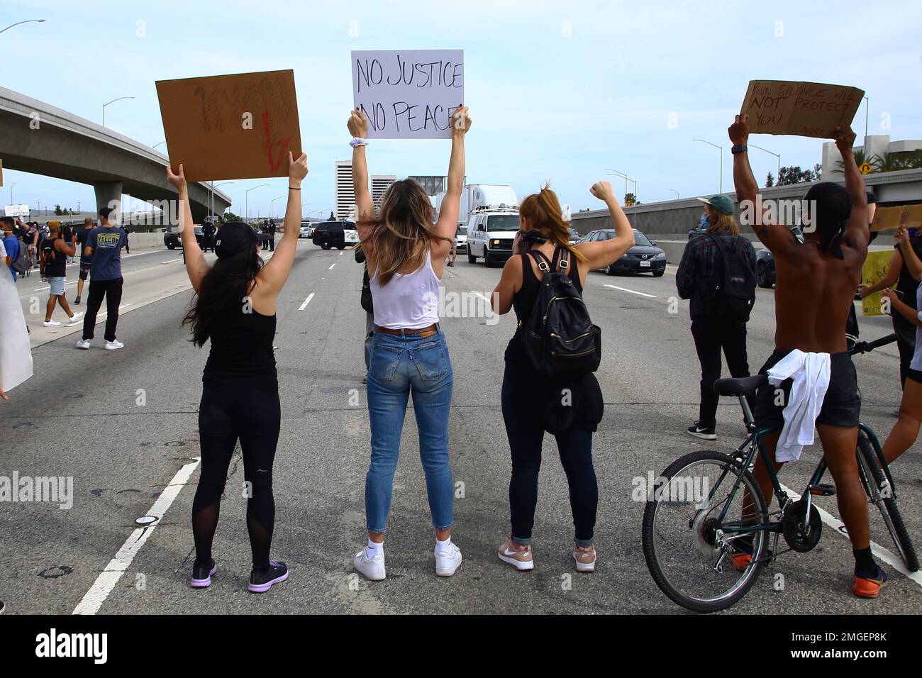 Protesters block traffic on the 405 freeway in Los Angeles during a ...
