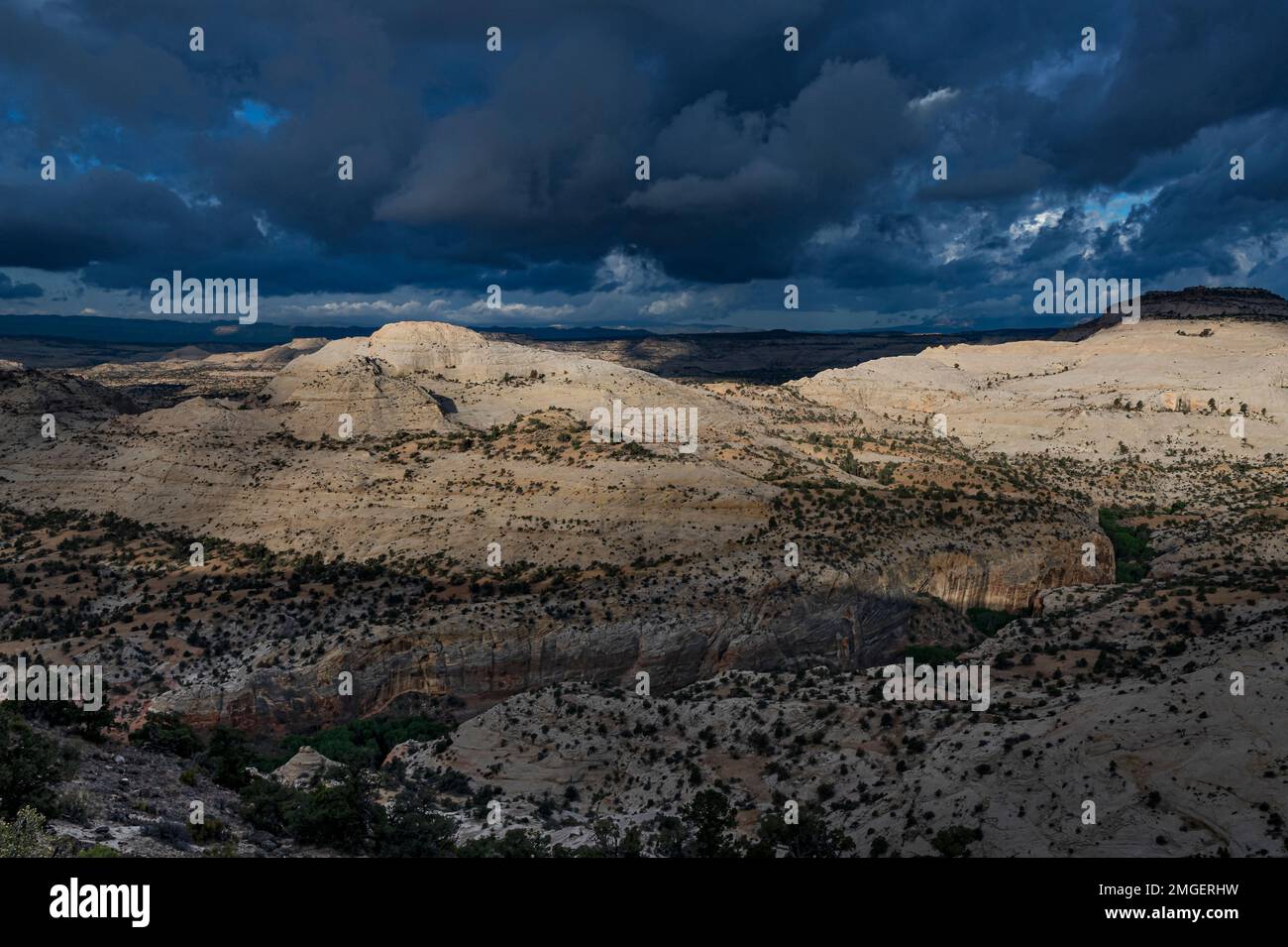 Storm clouds spread over buttes in Escalante Grand Staircase National ...