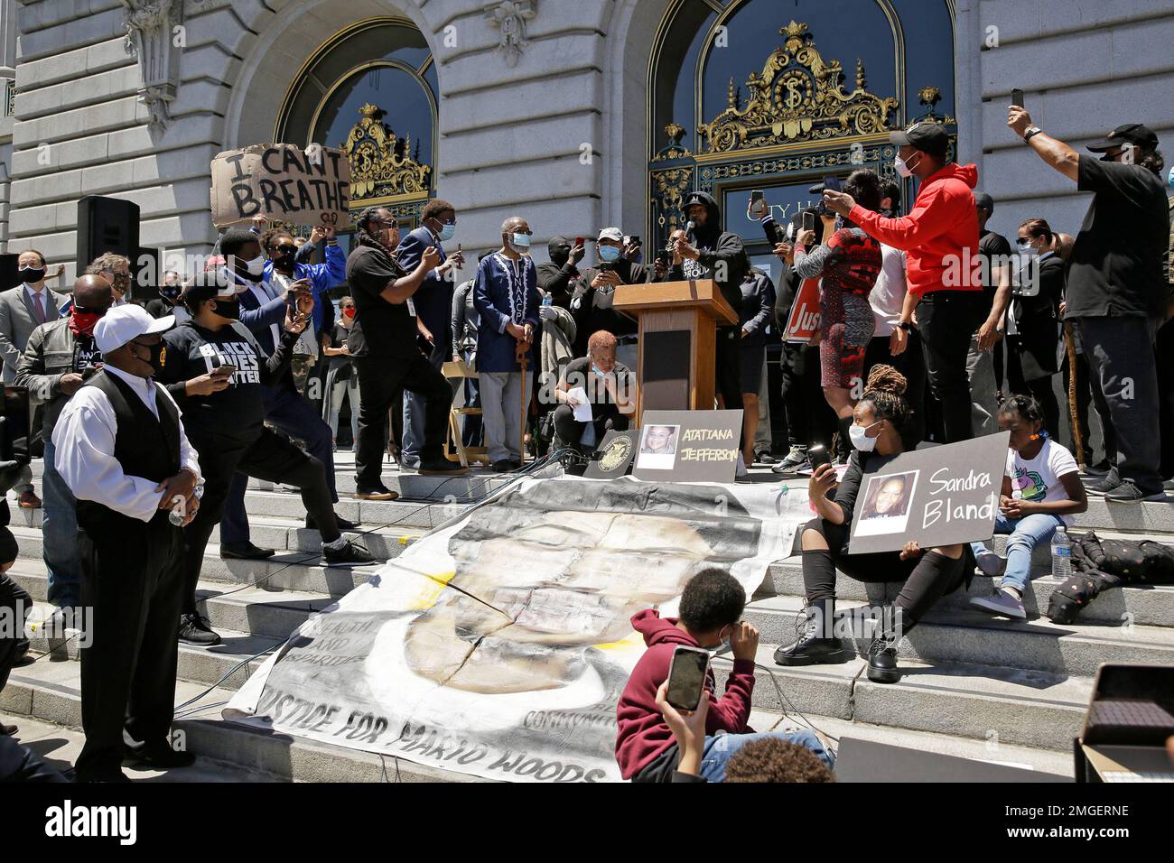 Jamie Foxx speaks to a large crowd during a "Kneel-In" to protest ...