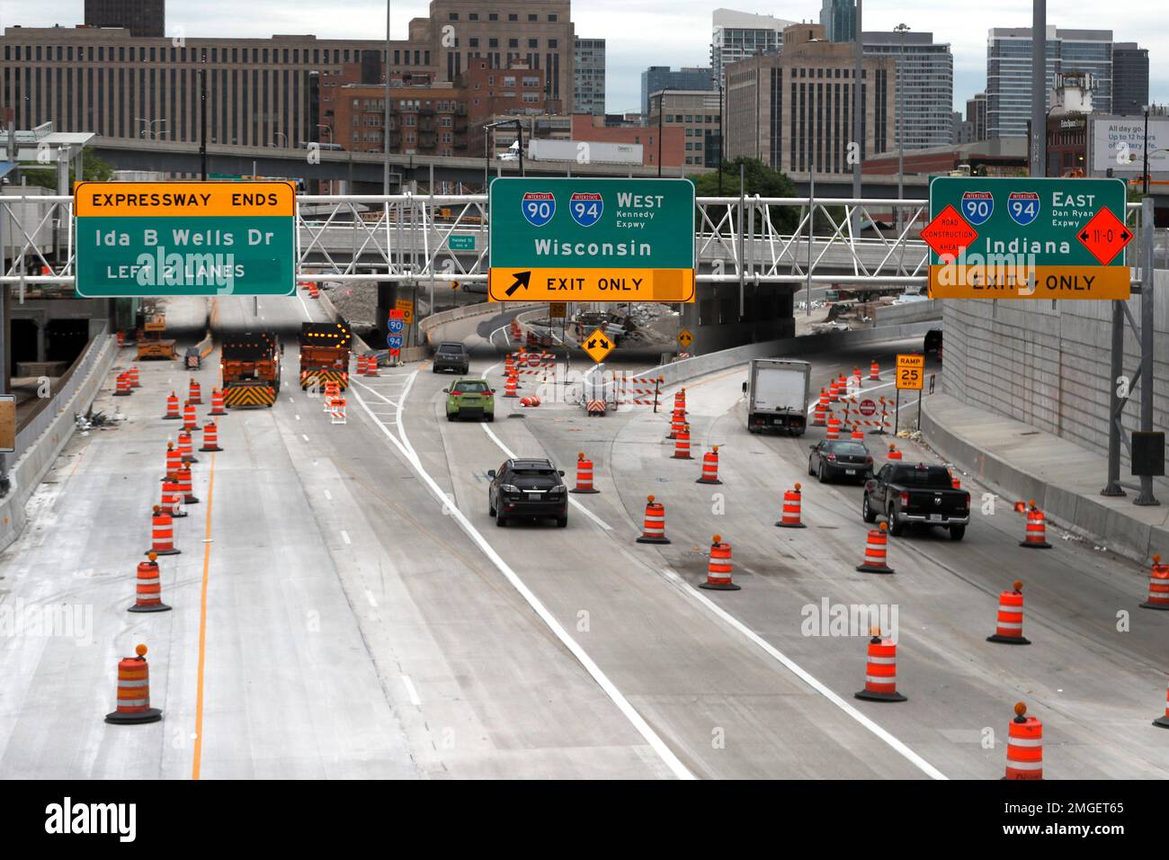 Trucks block the Eastbound lanes of the Eisenhower Expressway entering ...