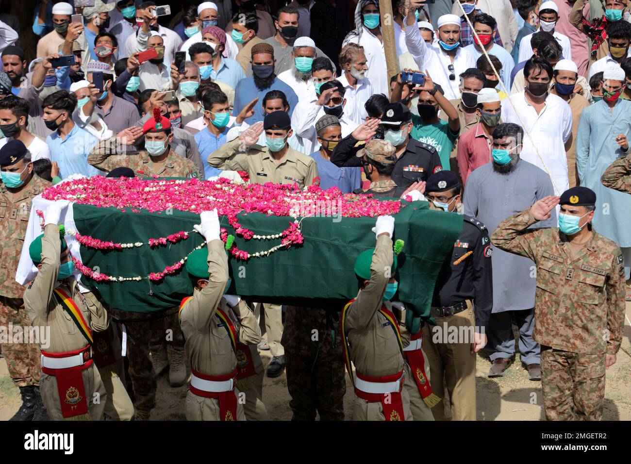 People attend a funeral of an army soldier who died in the crash of a ...
