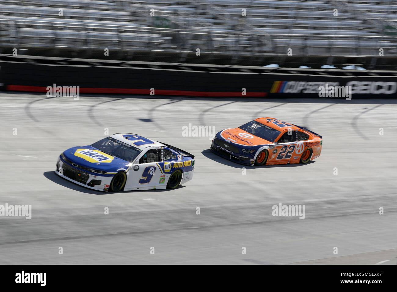 Chase Elliott (9) races followed by Joey Logano (22) during a NASCAR ...