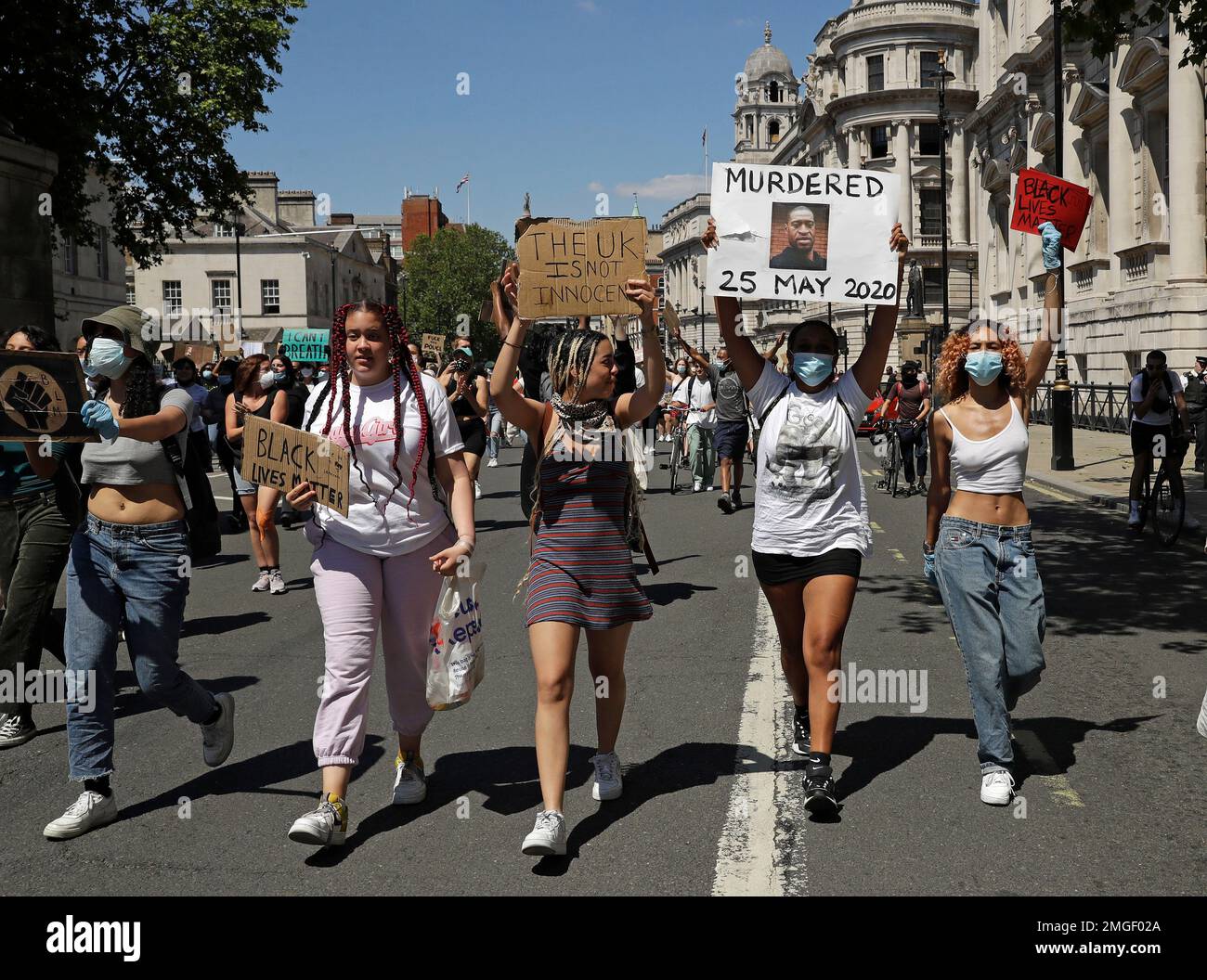 People march towards Trafalgar Square in central London on Sunday, May ...