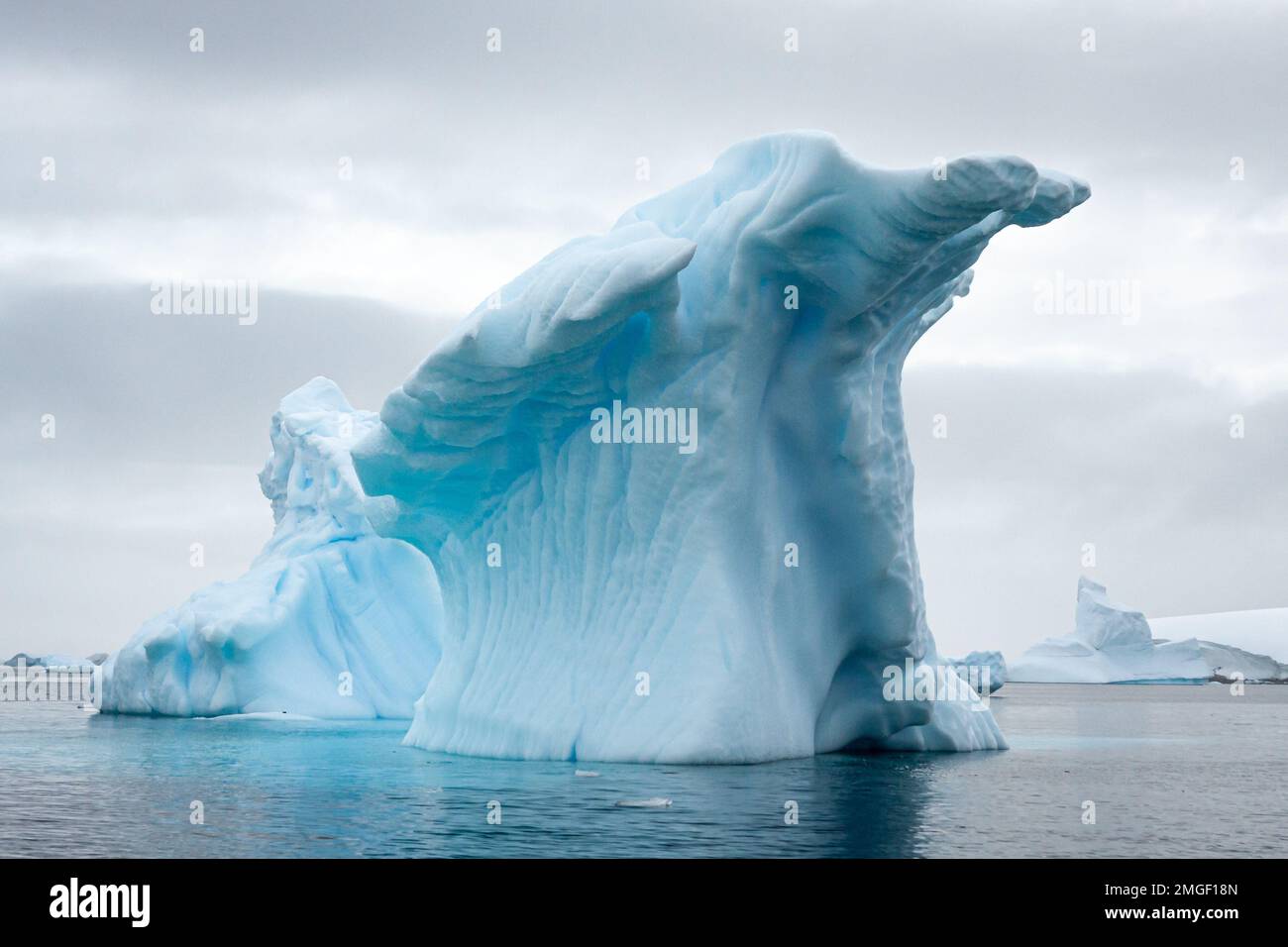 Icebergs, each totally individual, like hand-crafted ice sculpture ...