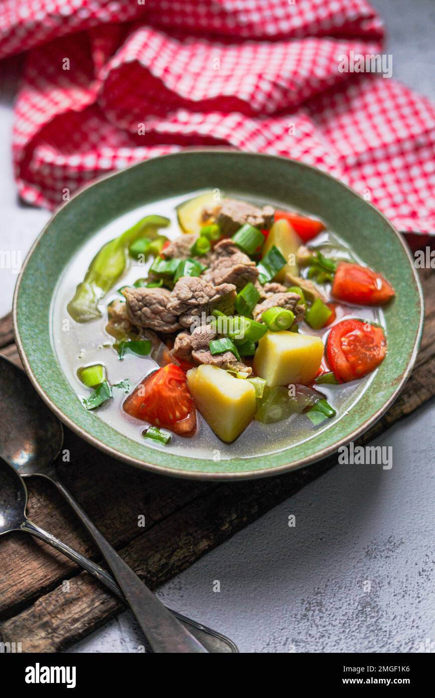 Sop Daging is Indonesian clear soup with beef and vegetables Stock ...