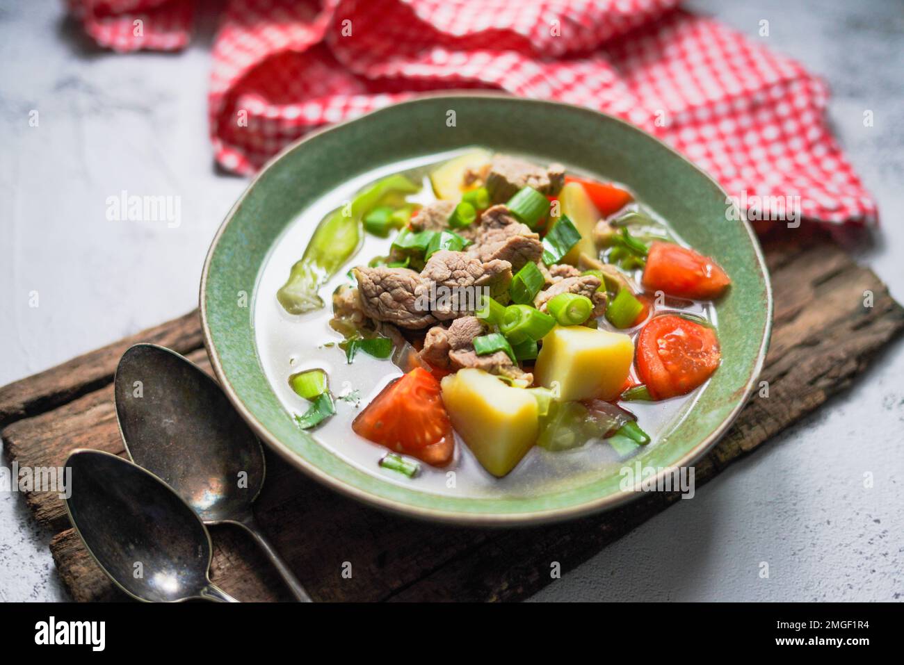 Sop Daging is Indonesian clear soup with beef and vegetables Stock ...