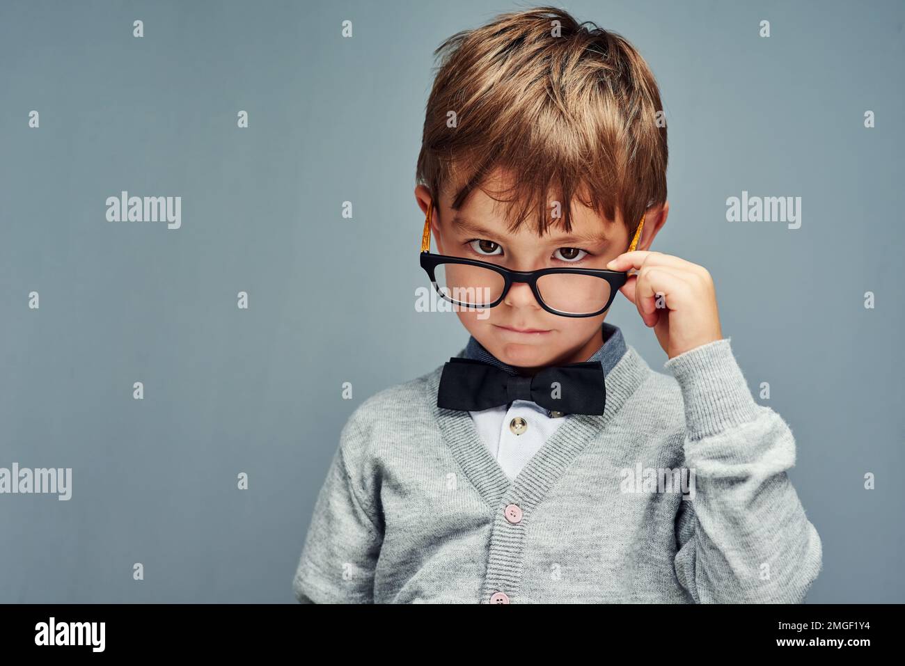 Dont waste my time. Studio portrait of a smartly dressed little boy ...