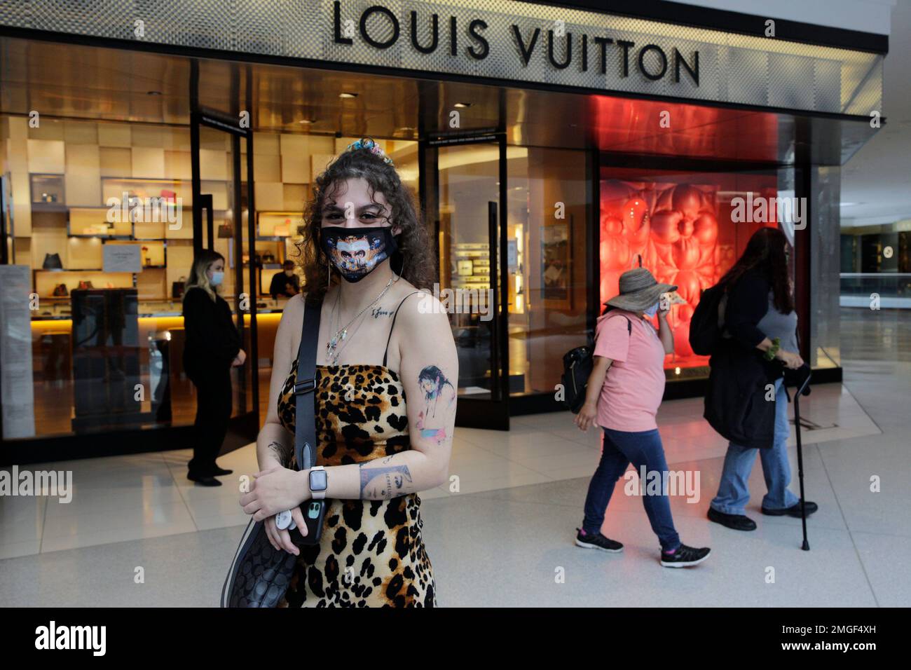 Singer Fallon Nicole, 23, left, shops at the Louis Vuitton boutique at ...