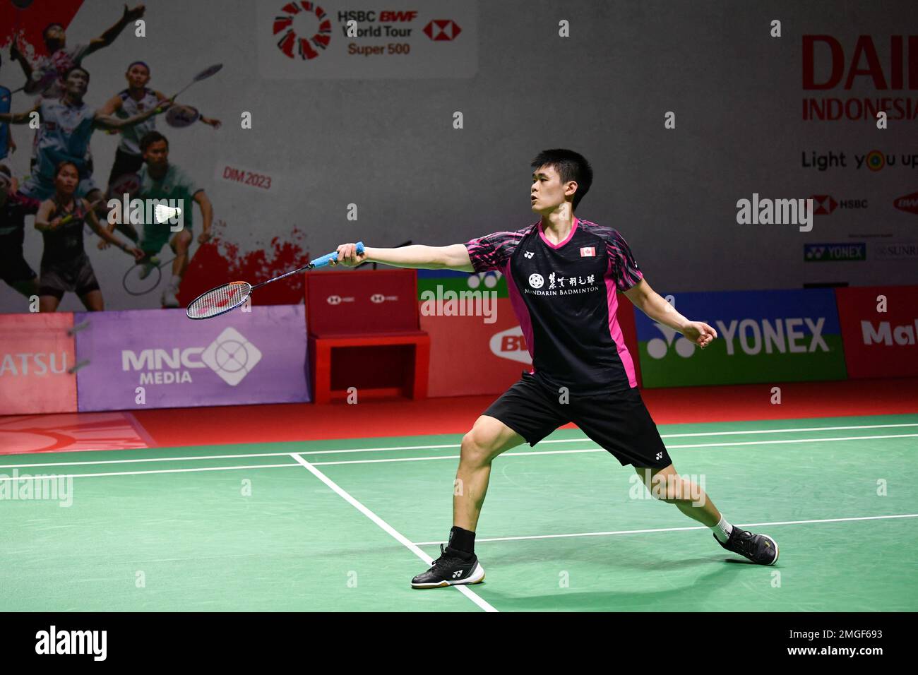 Jakarta, Indonesia. 26th Jan, 2023. Brian Yang of Canada hits a return ...