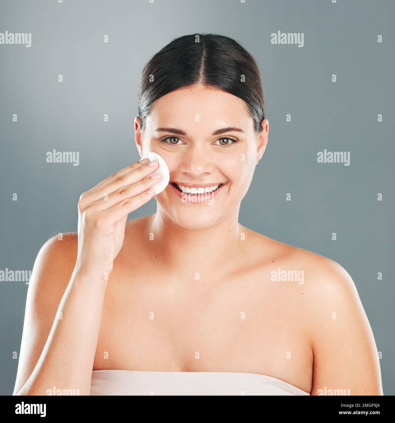 Cotton pad skincare, beauty portrait and wellness woman model cleaning face for wellness and ...