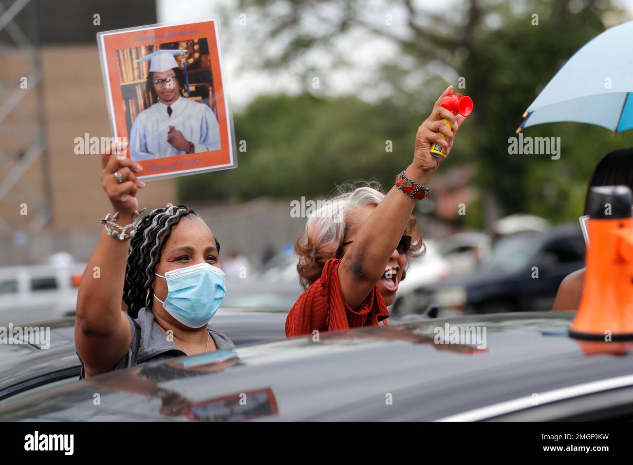 Micheal Pitts, left, and Deborah Bibbins, mother of graduate Cameron ...
