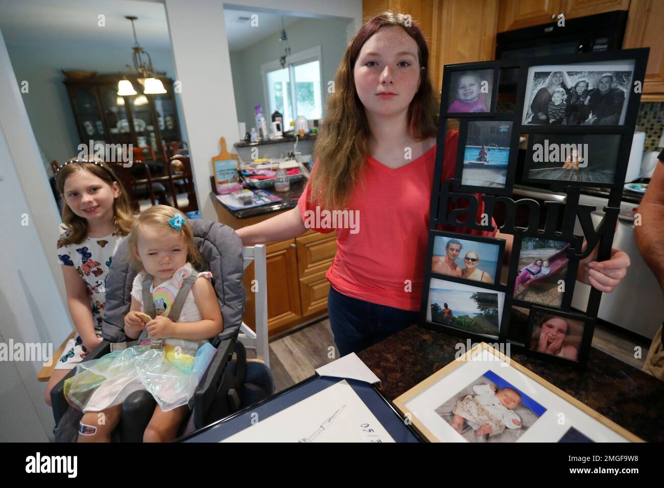 Morgan Nixon, right, poses with her sisters, Mackenzie, left, Madilyn ...