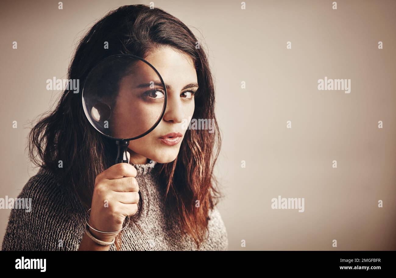 Looking through a magnifying glass hi-res stock photography and images ...