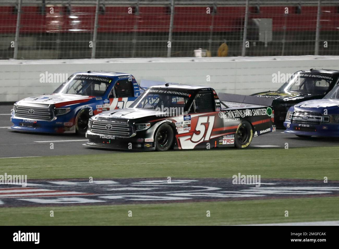 Kyle Busch (51) drives during a NASCAR Truck Series auto race at ...