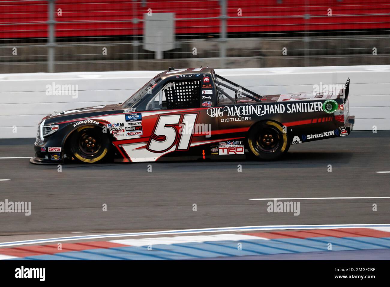 Kyle Busch drives during a NASCAR Truck Series auto race at Charlotte ...