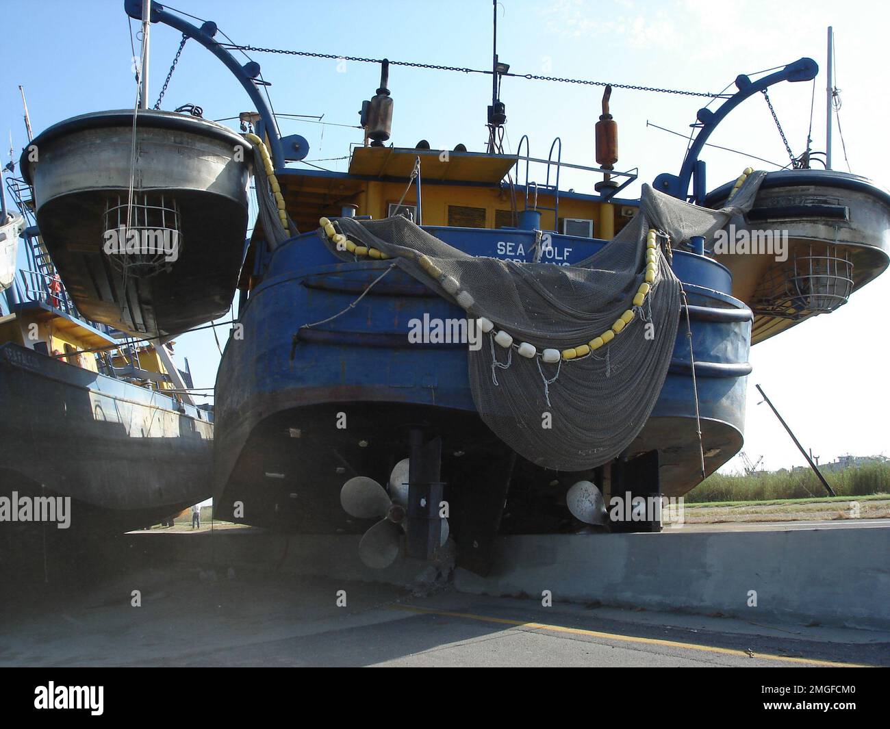 Aftermath - Displaced Boats - Empire, Louisiana - 26-HK-26-145. rear ...