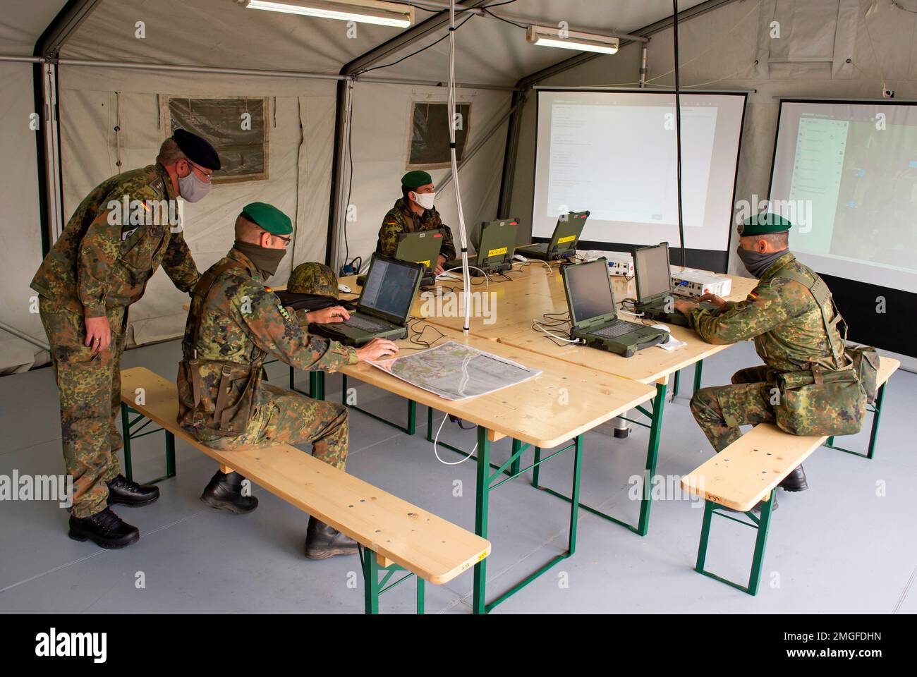 Soldiers of the German Federal Armed Forces Bundeswehr present the ...