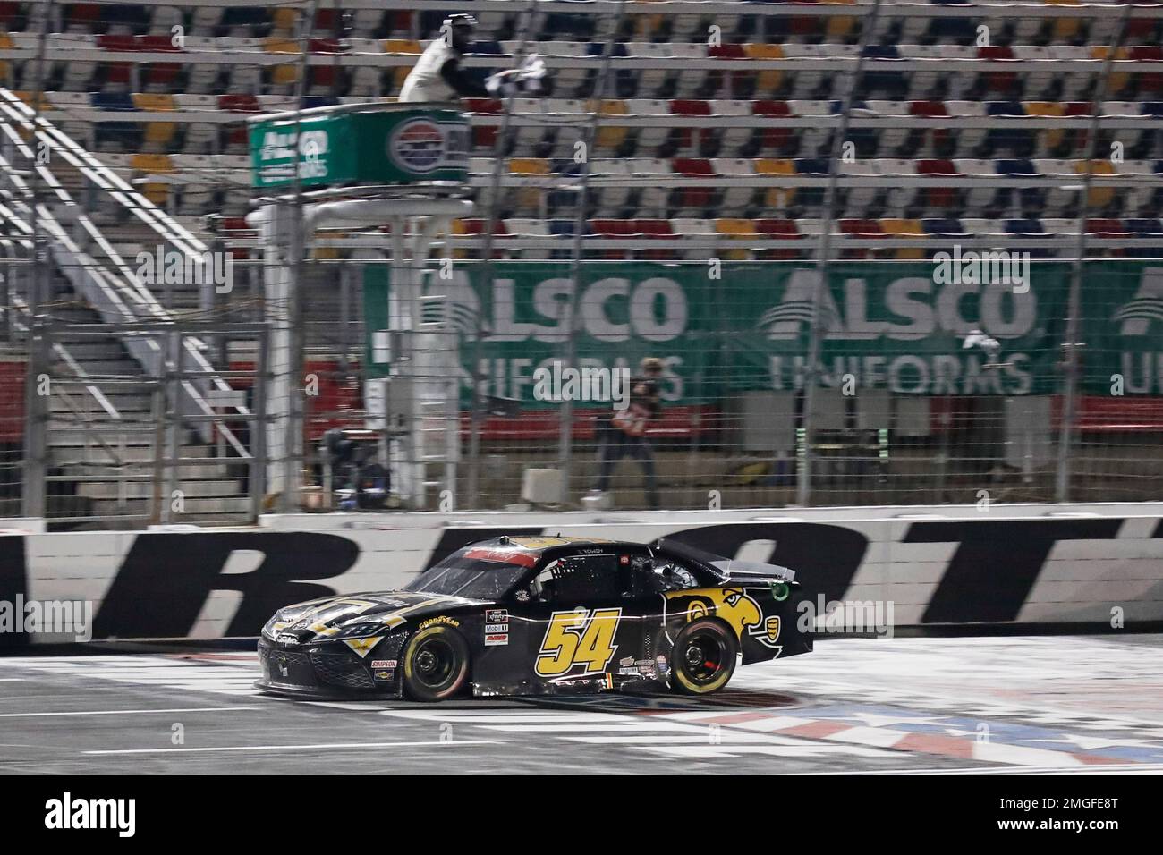 Kyle Busch crosses the finish line to win the NASCAR Xfinity Series ...